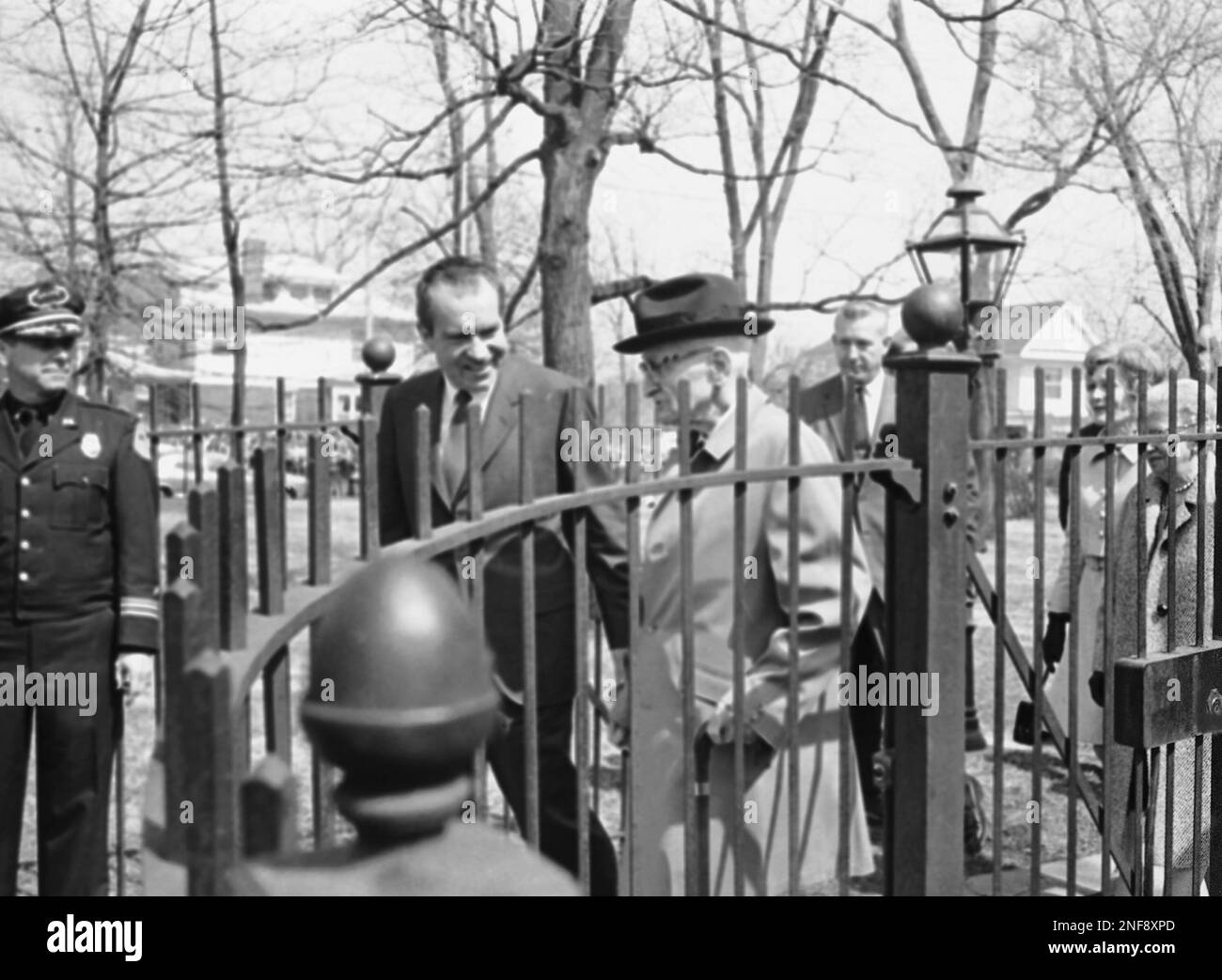 President Richard Nixon smiles as he helps former President Harry ...