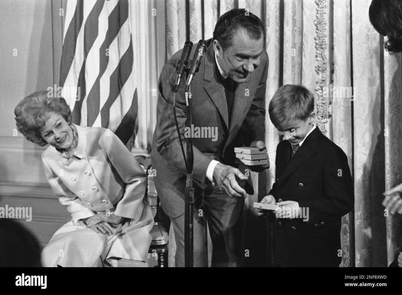 Timothy Disney receives a commemorative medal honoring his late uncle ...