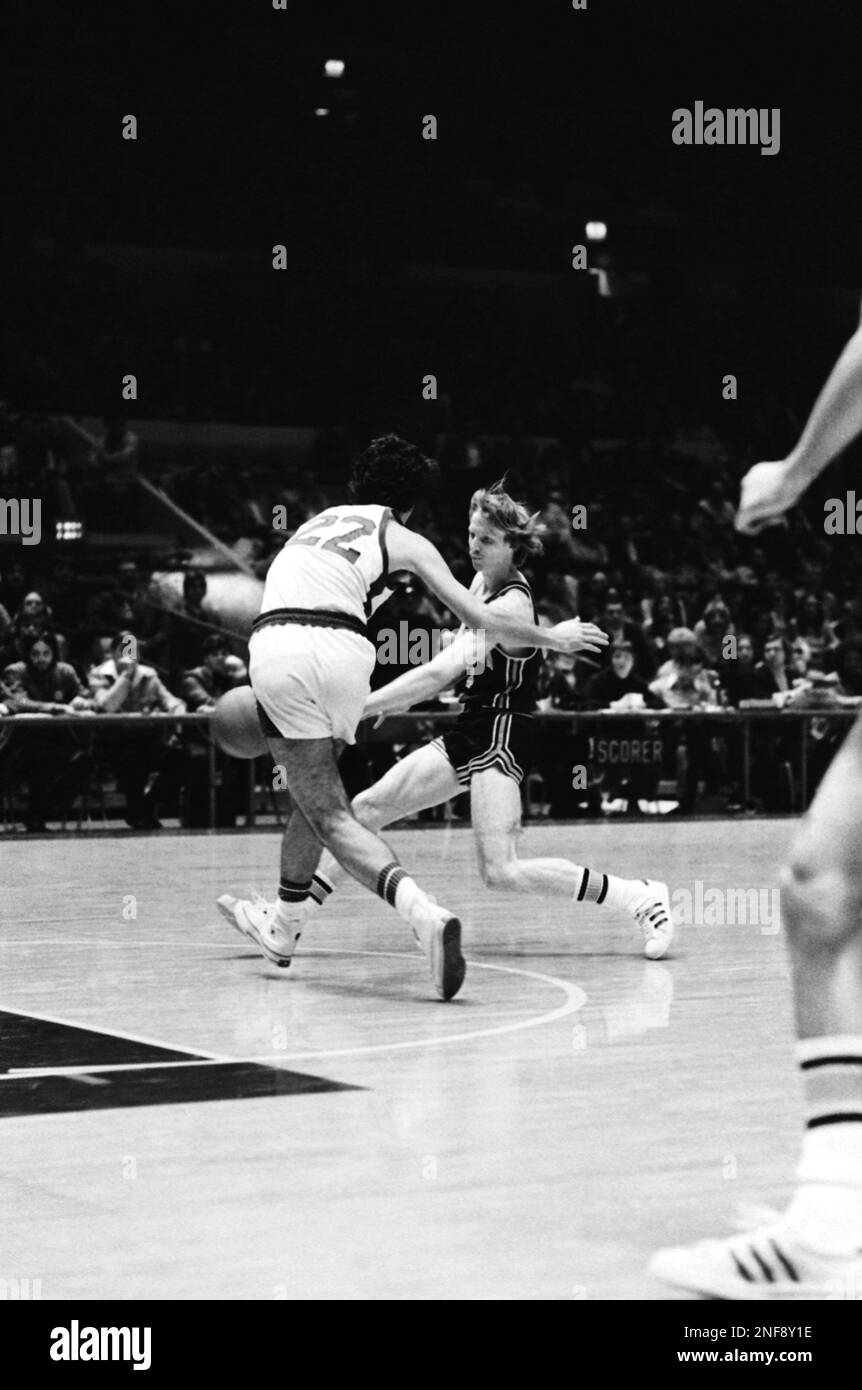 Michael Vicens (22) of Holy Cross and Brian O'Neill of Princeton go for ...