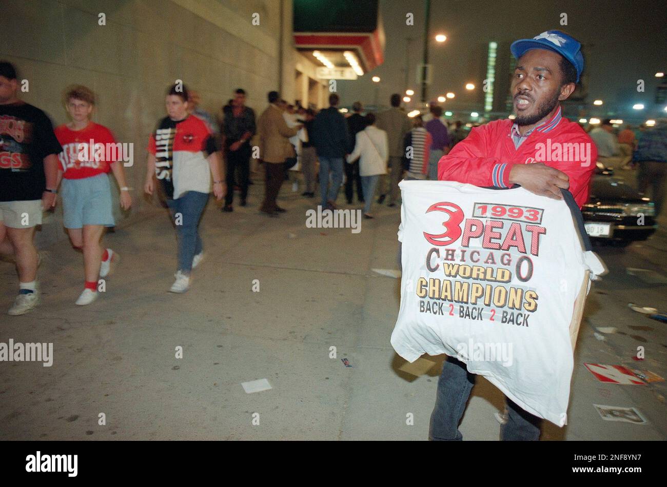 Anthony Williams can't find many takers for his 3-peat T-shirts outside ...