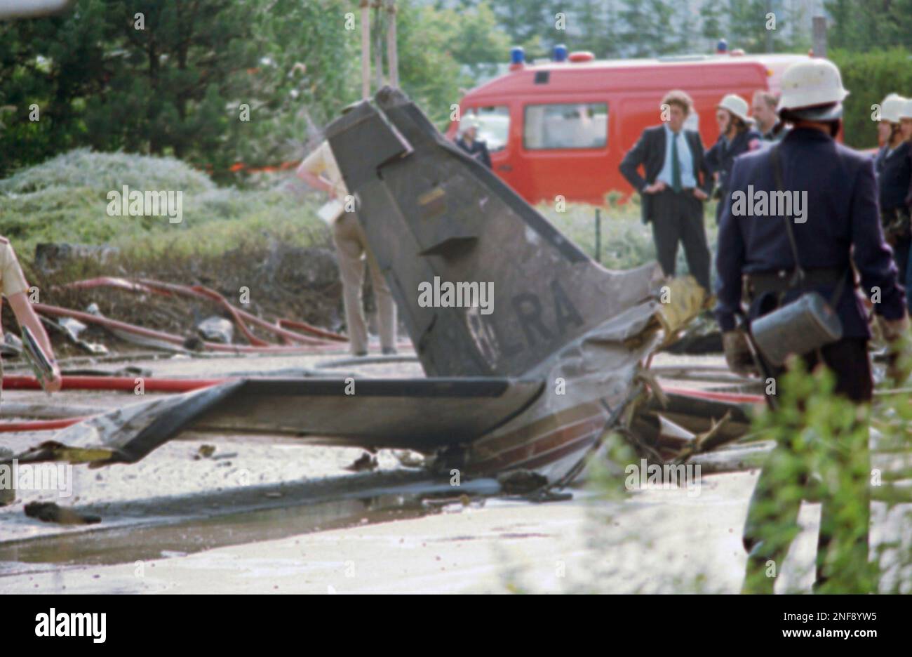 The tail end of the Piper Cheyenne which crashed into a McDonald's ...