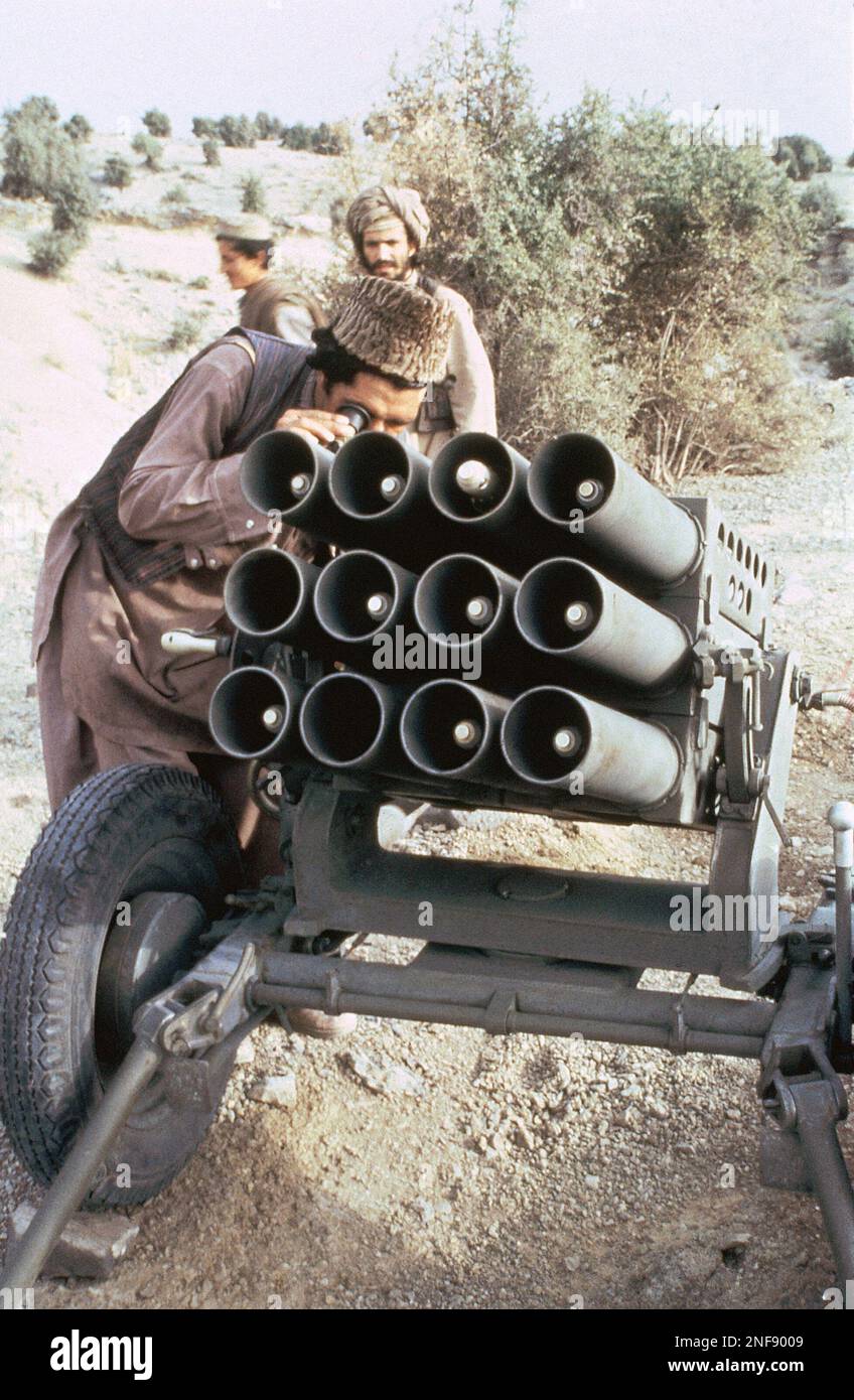 A Mujahedeen guerrilla trains his RPG-7 Soviet-made rocket launcher on ...