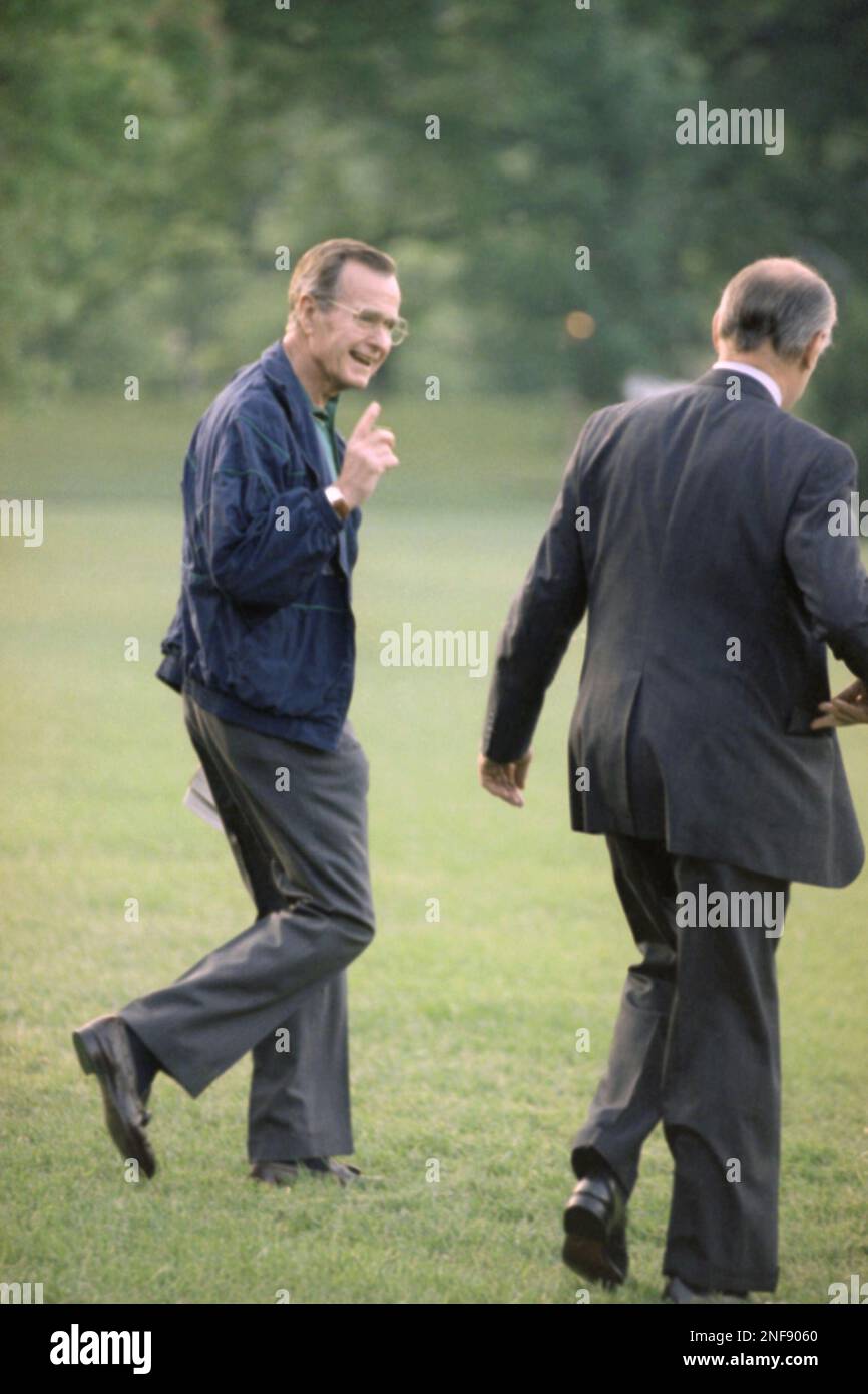 President George Bush converses with Dr. Burton Lee, his personal ...