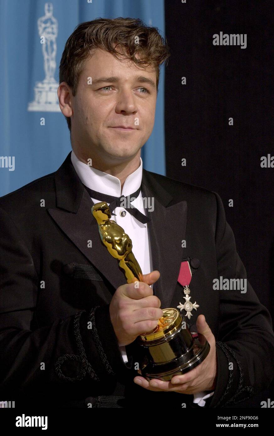 Actor Russell Crowe poses with his Oscar for best actor for his work in ...