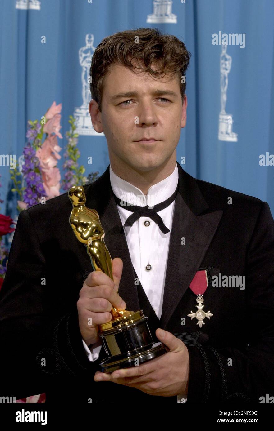 Actor Russell Crowe poses with his Oscar for best actor for his work in ...