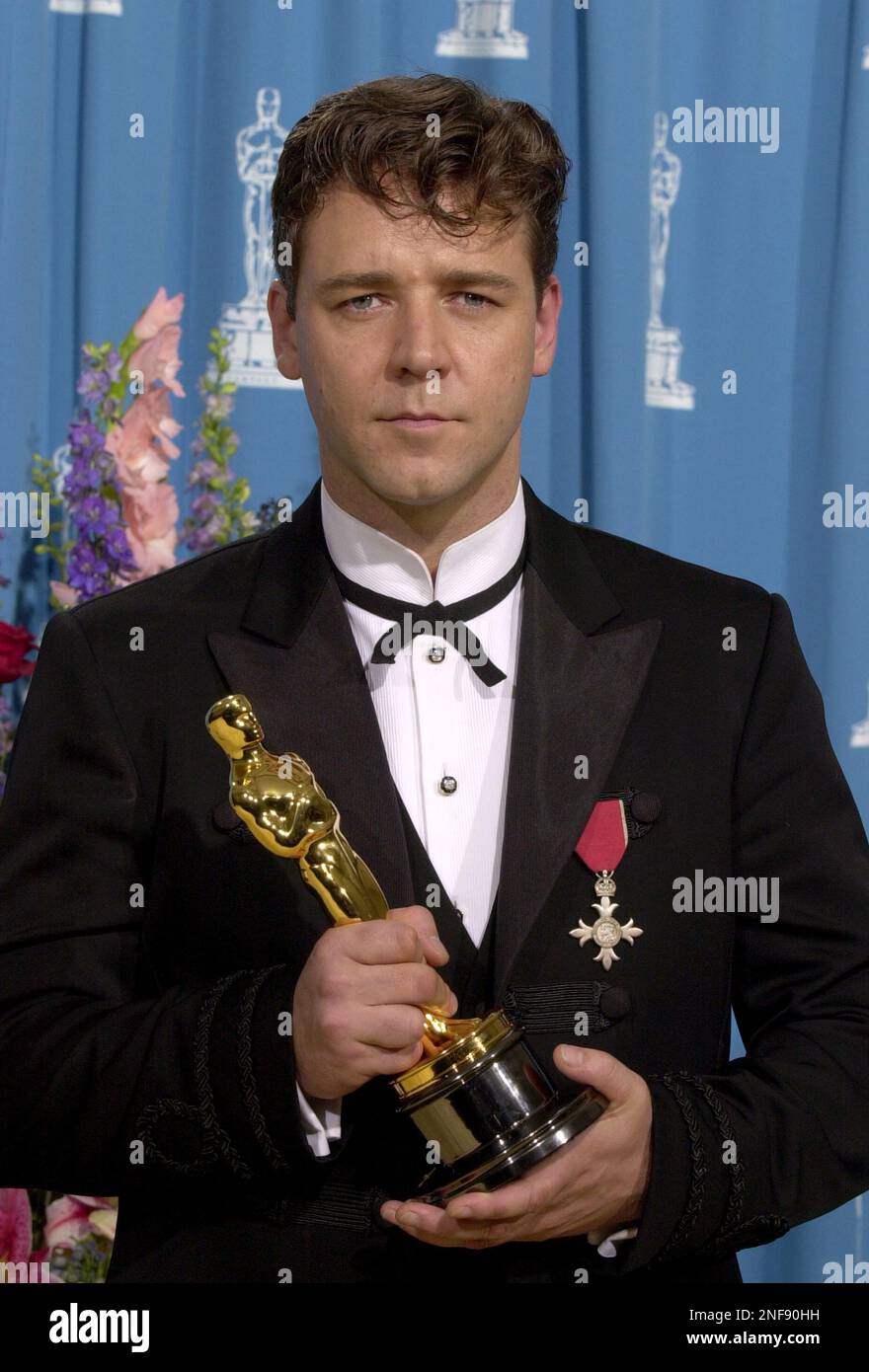Actor Russell Crowe poses with his Oscar for best actor for his work in ...