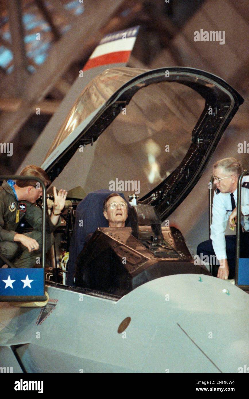 U.S. President George Bush sits in the cockpit of an F-22 Stealth ...