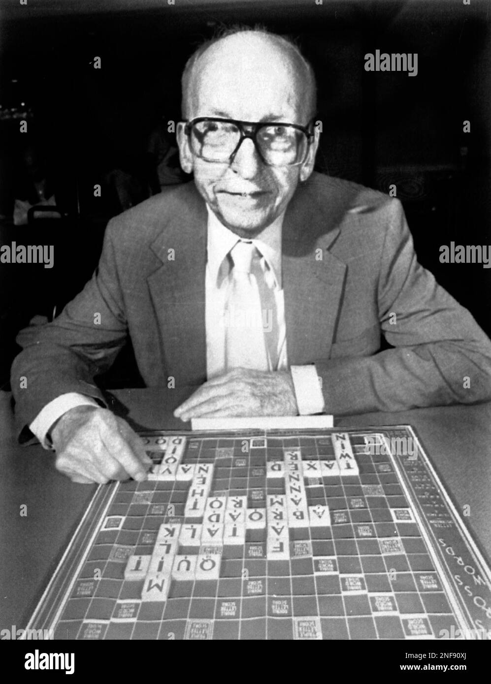 Alfred Butts, the inventor of scrabble, is seen playing a game of ...