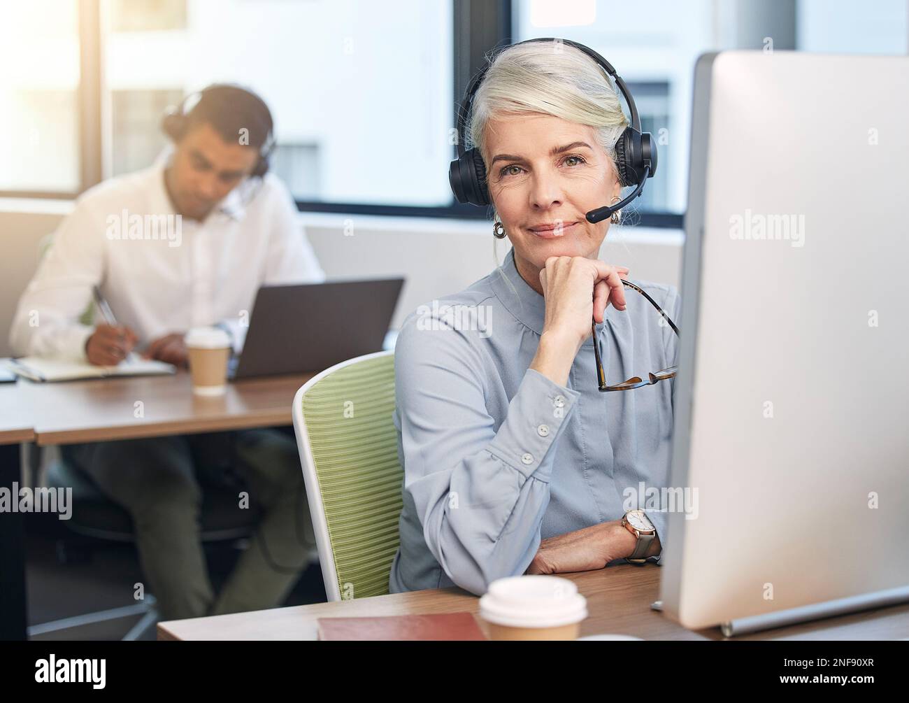 Face of call center woman, telemarketing agent or consultant with ...
