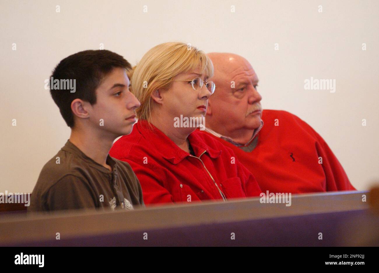 Tony East, 15, left, and his mother Lori East and their friend Les ...