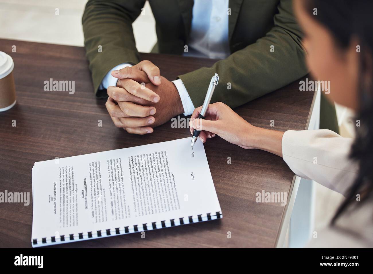 Two business woman signing documents hi-res stock photography and ...
