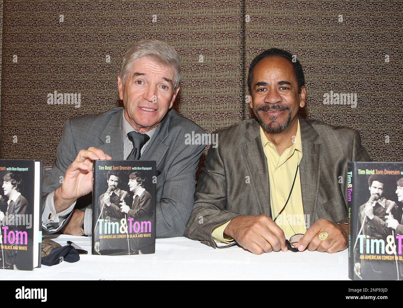 Tom Dreesen and Tim Reid attend Mike Ditka's Gridiron Greats Autograph ...