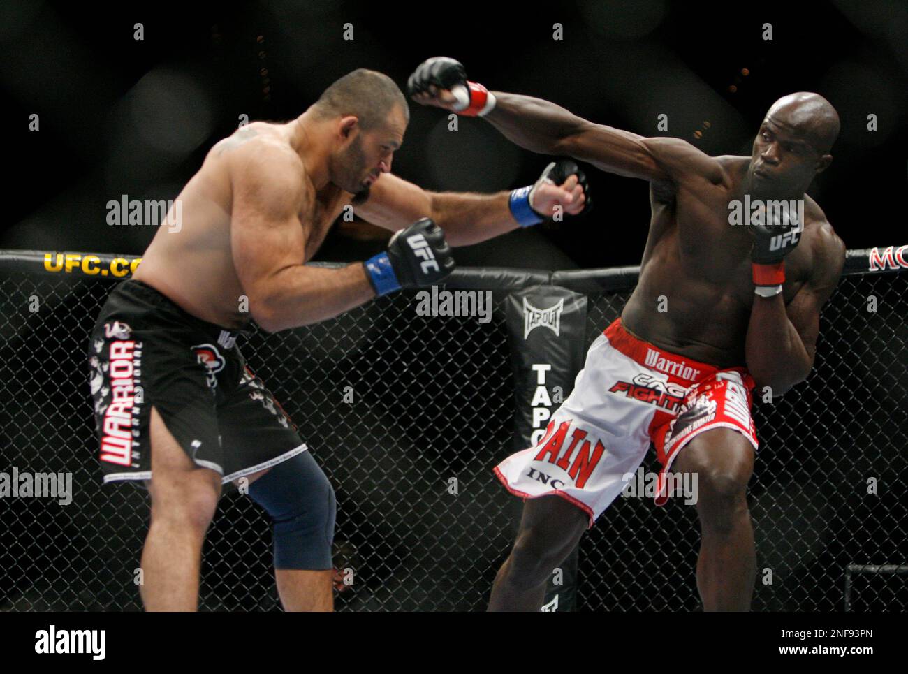 Cheick Kongo, right, in action against Mostapha Al Turk during their ...