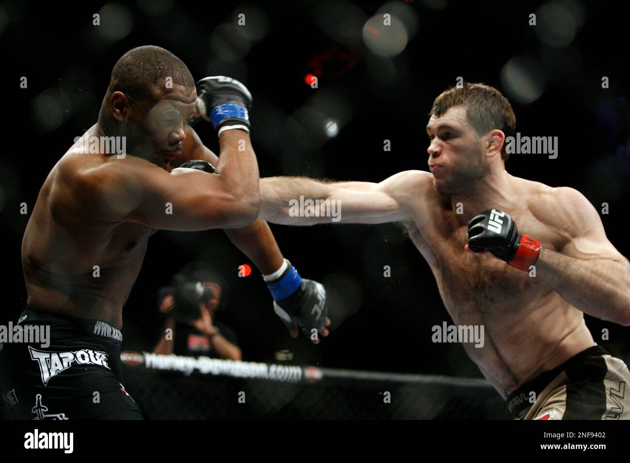 Forrest Griffin, right, in action against Rashad Evans for the UFC ...