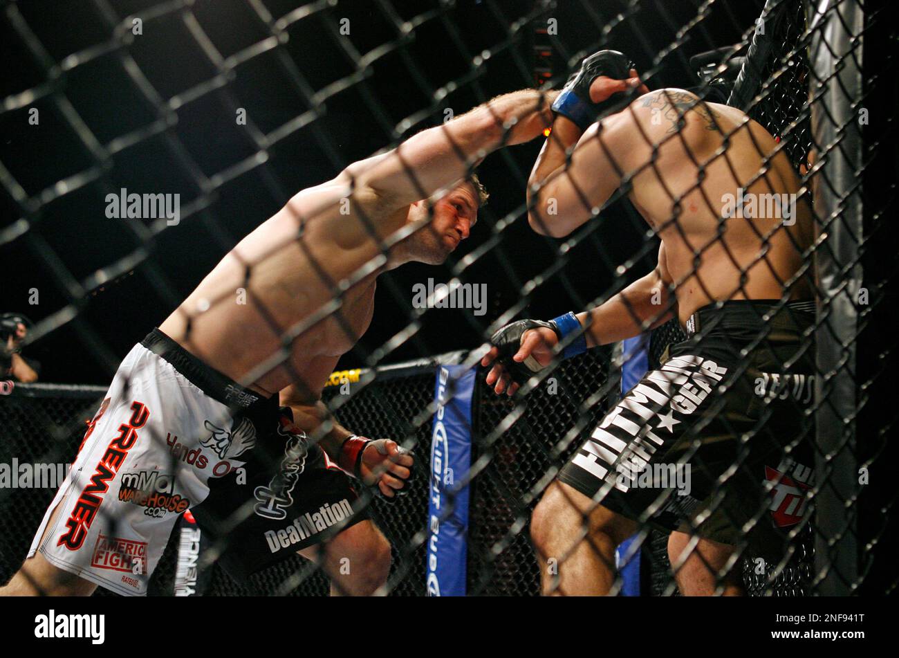 Matt Hamill, left, exchanges punches with Reese Andy during their UFC ...