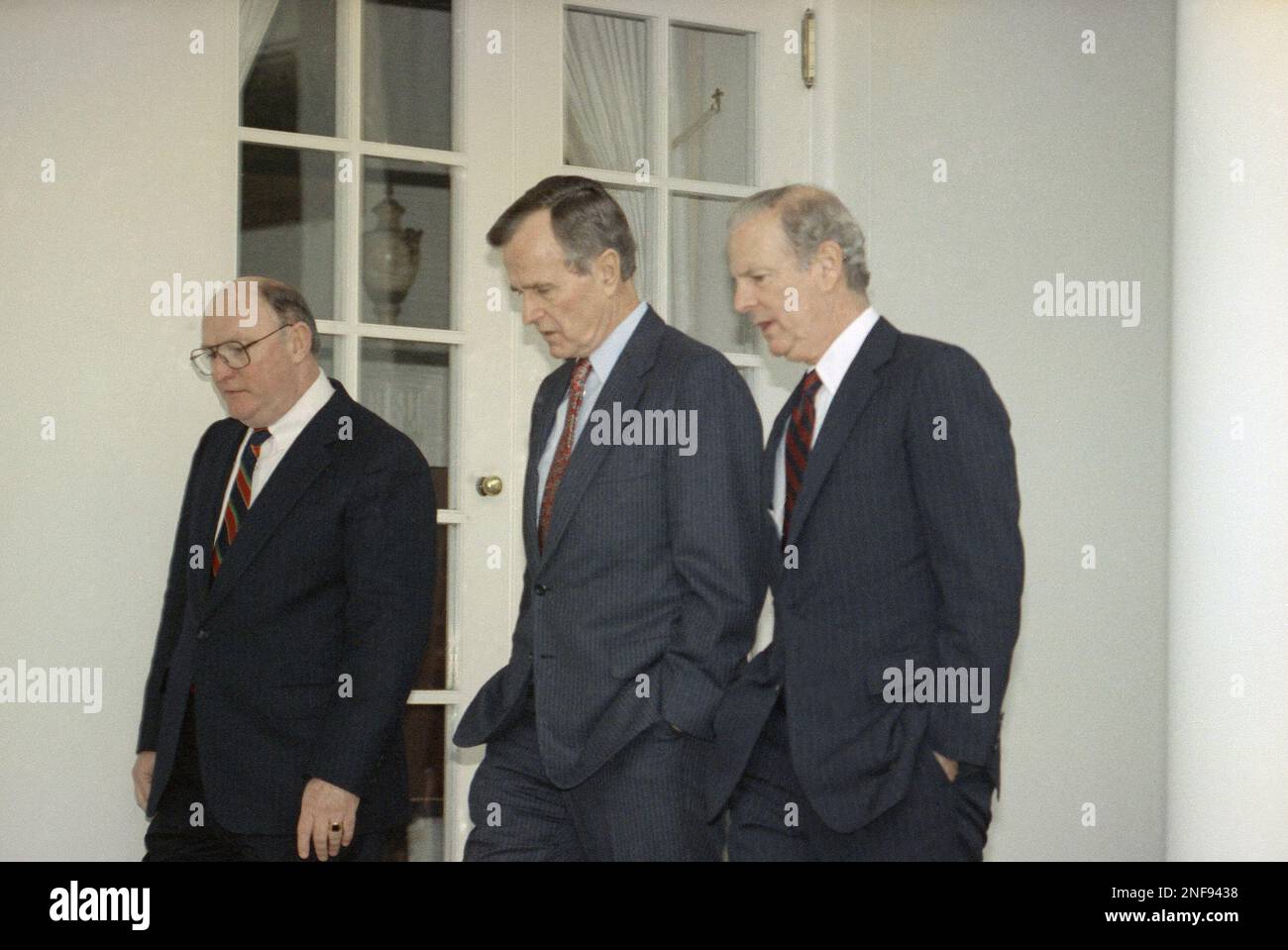 President George Bush and Secretary of State James A. Baker III walk ...