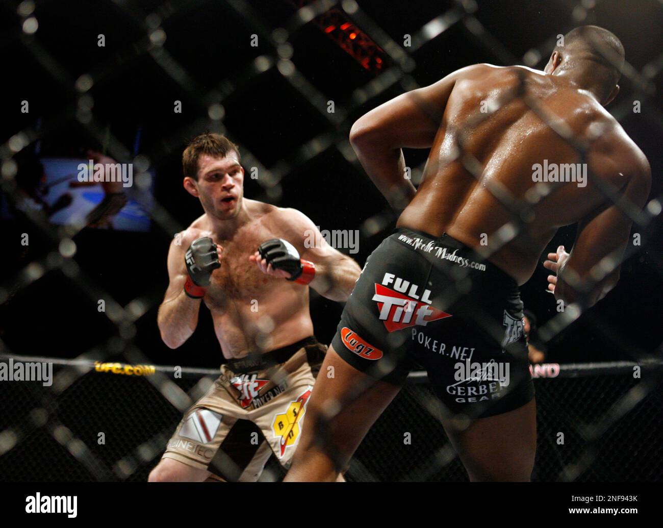 Forrest Griffin, left, in action against Rashad Evans for the UFC light ...