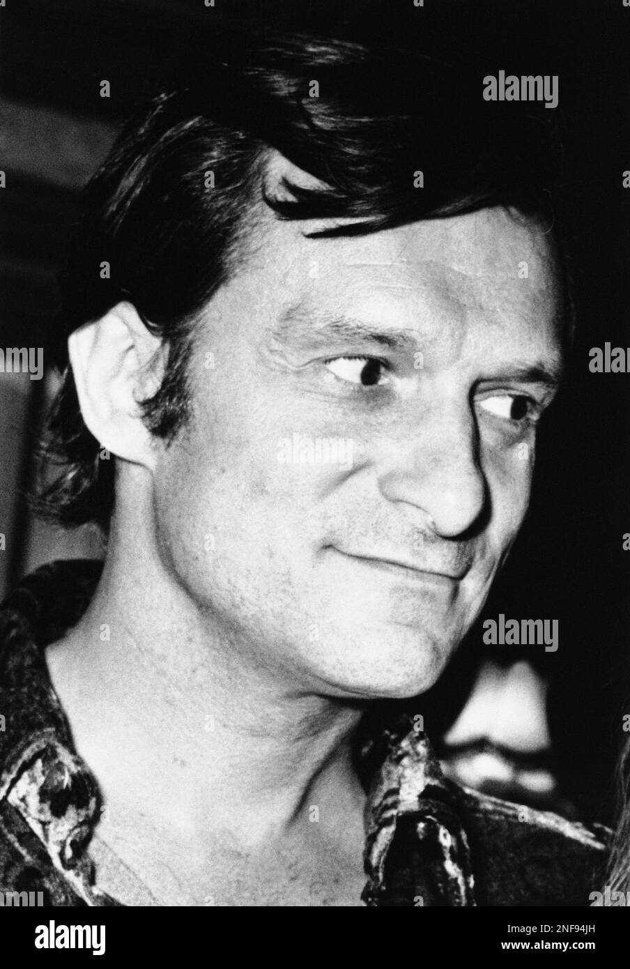 Hugh Hefner of Playboy fame, is shown during a break in the filming of ...