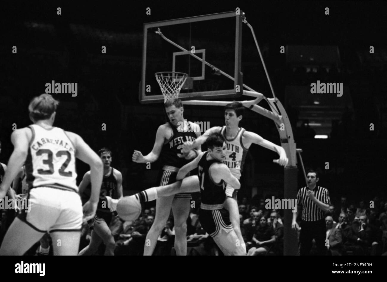 Tom Owens of South Carolina fights for loose ball in second half action ...