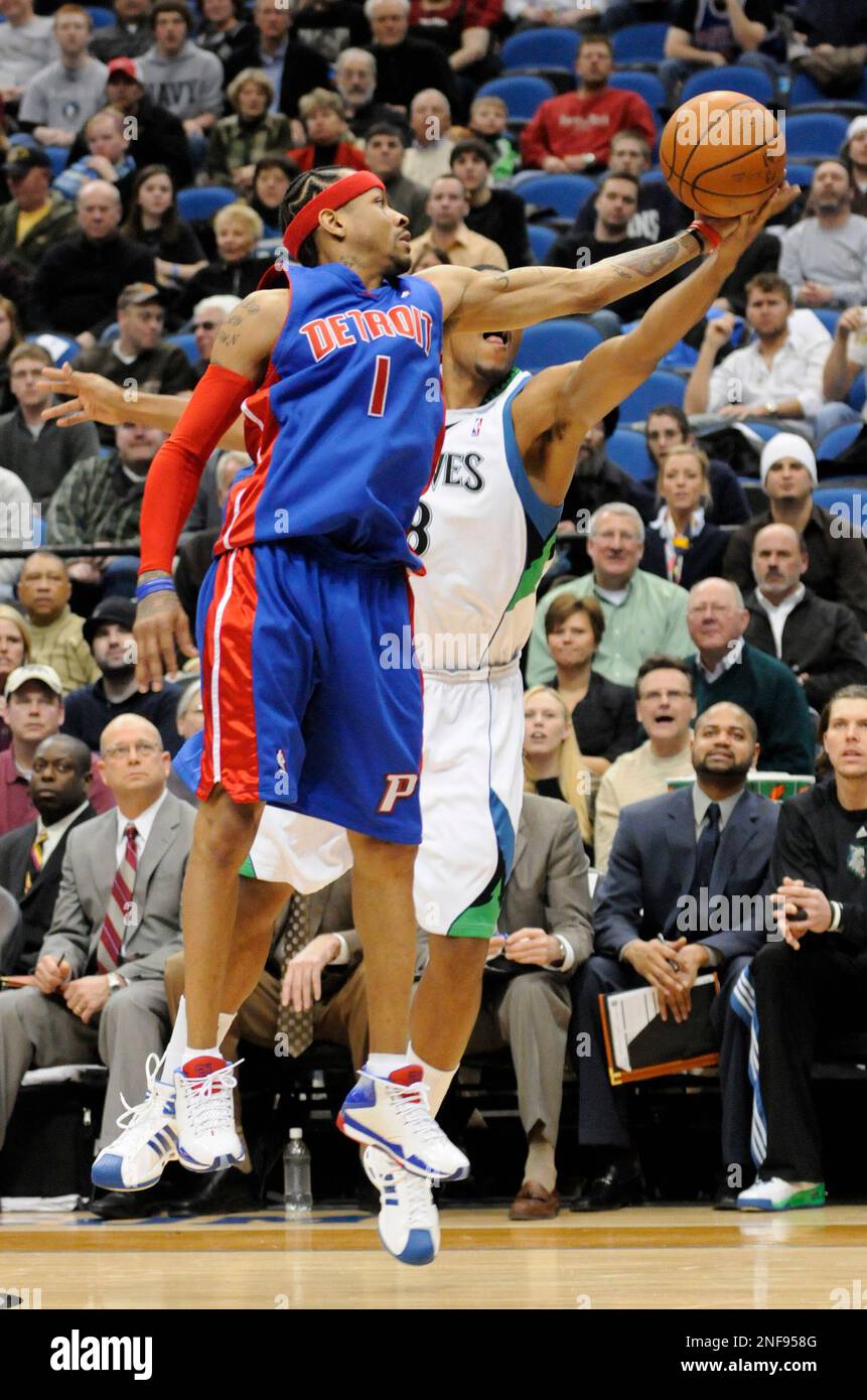 Detroit Pistons' Allen Iverson, left, grabs a rebound away from ...
