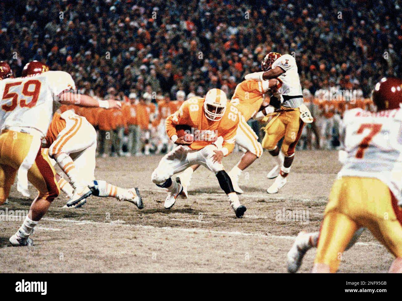 Tennessee running back Keith Davis (28) looks for running room as a ...