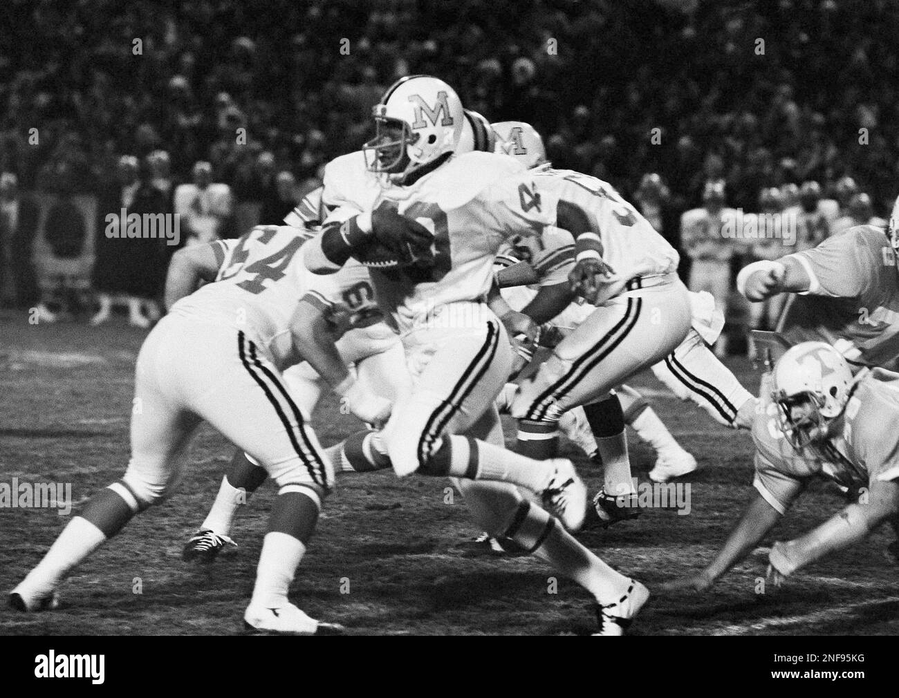 University of Maryland's Kenny Roy (40) leaves a trail of would-be ...