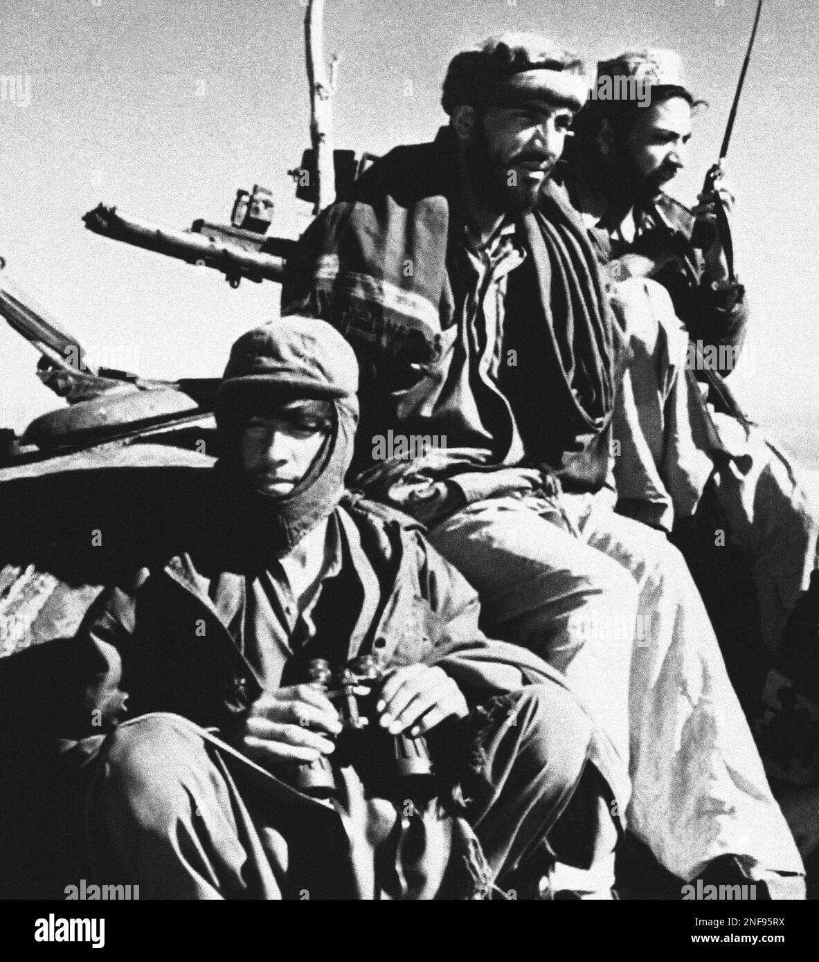 Afghan rebel guerrillas fighting against the Soviet-backed Najib regime ...
