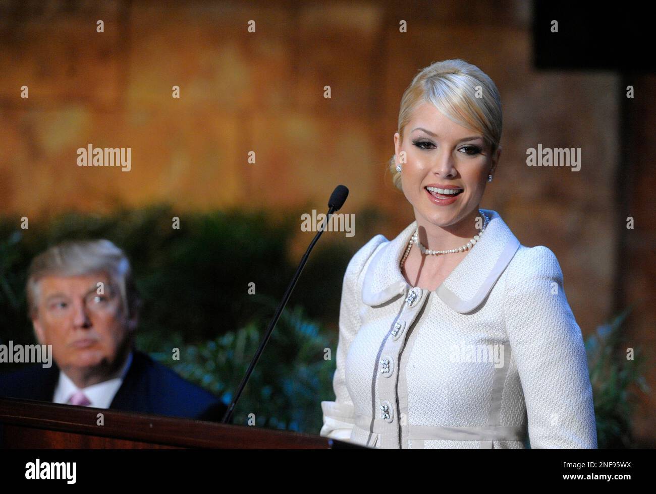 Executive Producer Donald J. Trump listens to Former Miss USA Tara ...