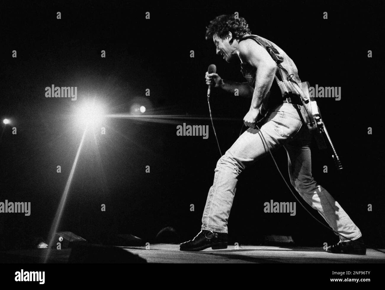 Bruce Springsteen is spotlighted as he entertains fans at his second ...