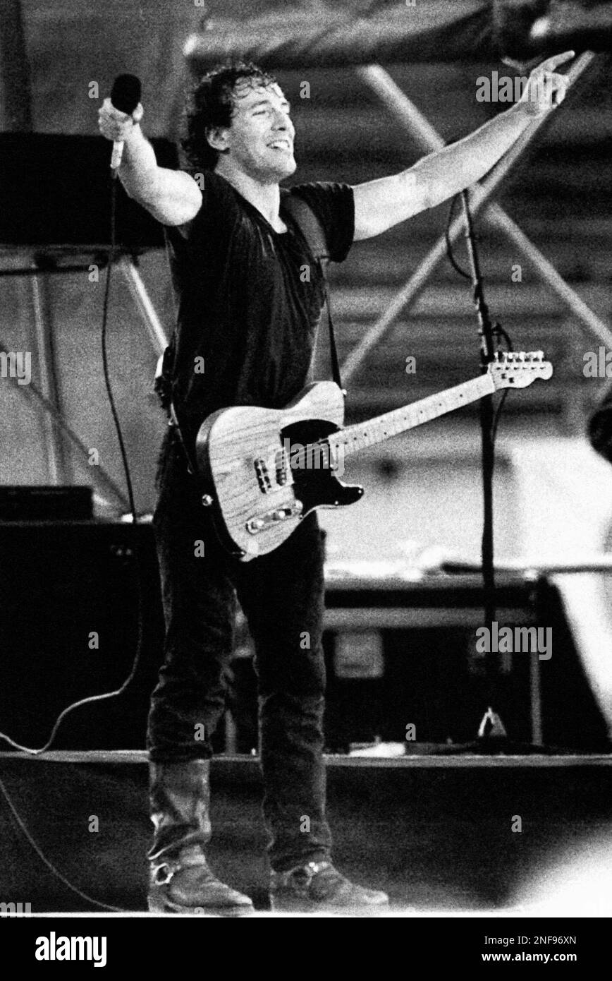 American rock star Bruce Springsteen salutes the audience during on ...