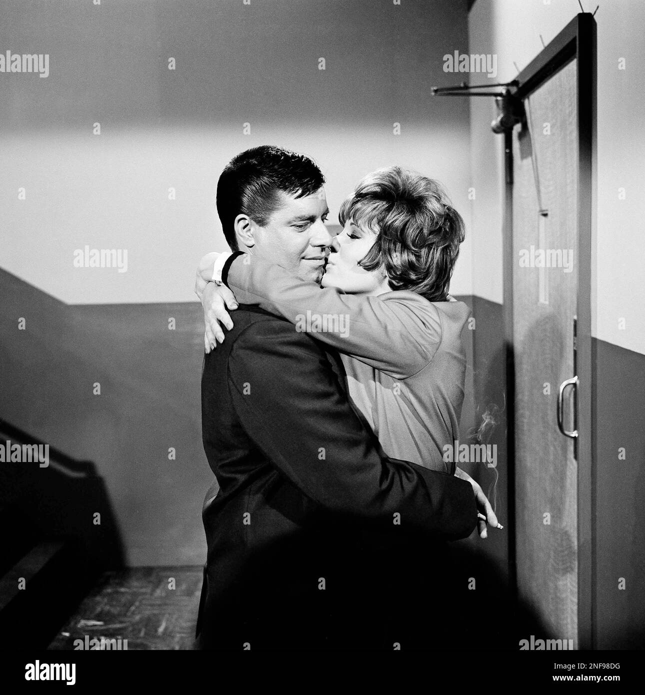 Actress Jill St. John kisses co-star Jerry Lewis in their film "Who's ...