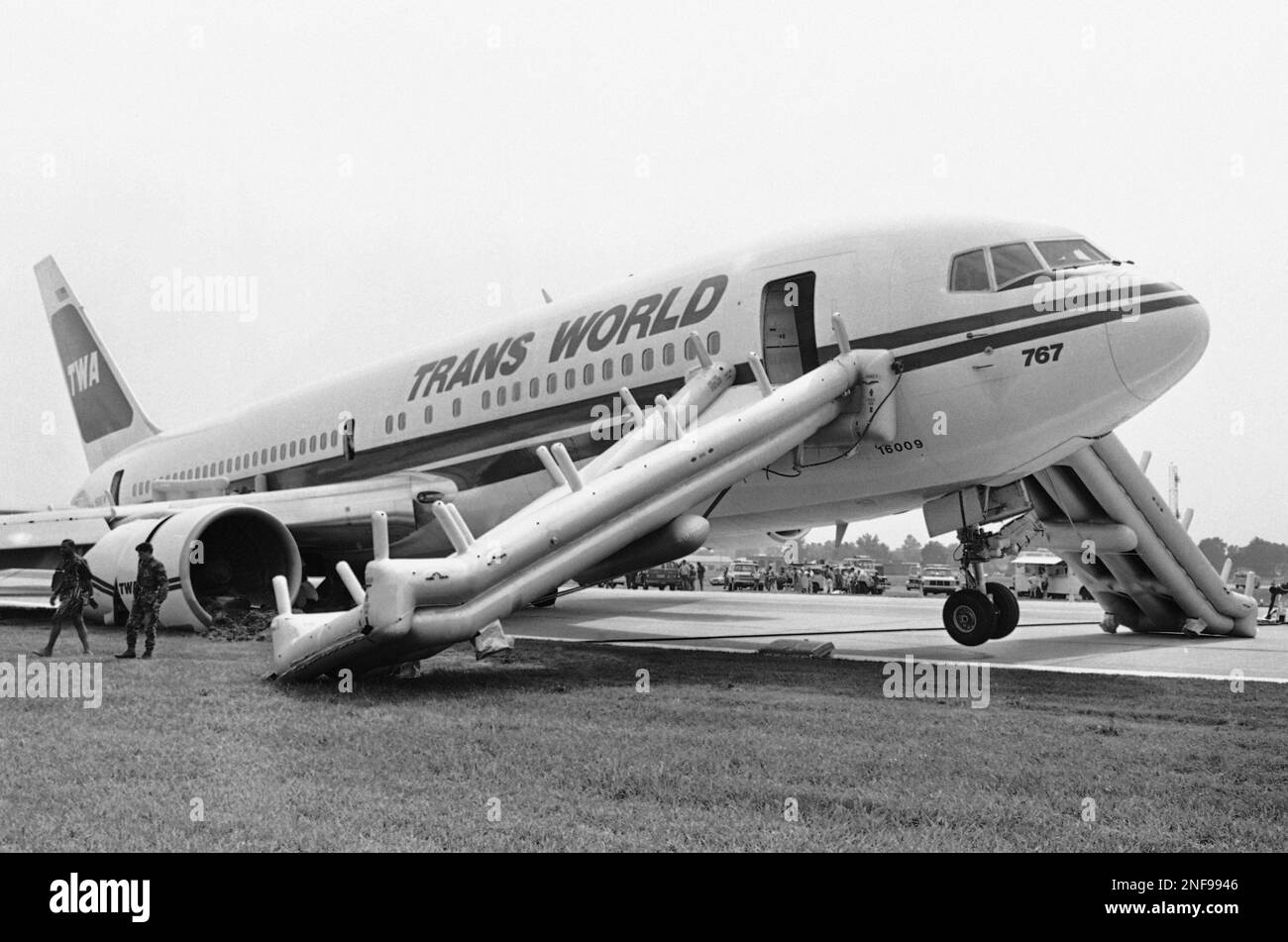TWA Flight 756, from San Francisco to St. Louis sits along the runway ...