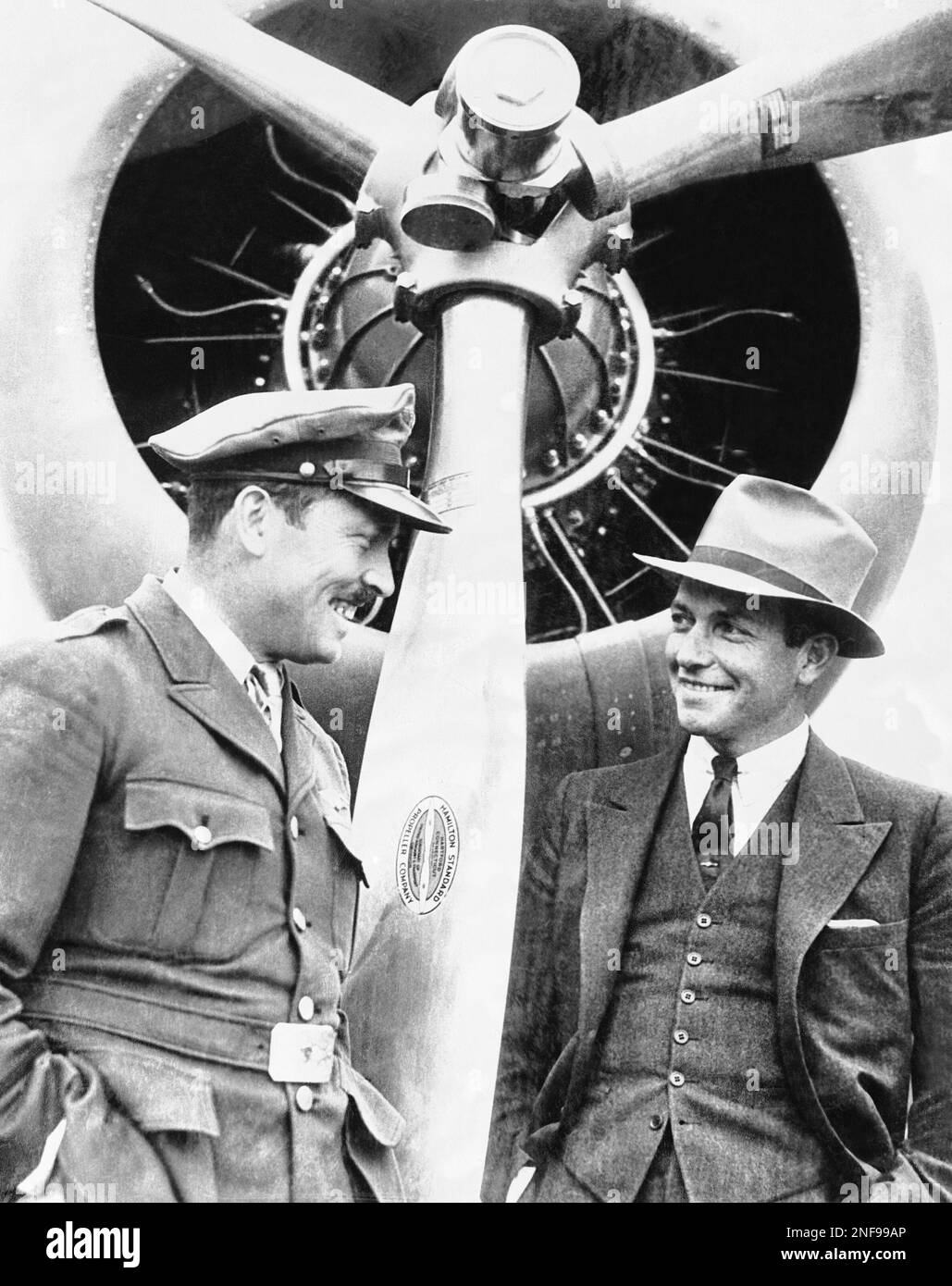 Col. Roscoe Turner, American aviation speed king, left, and Clyde ...