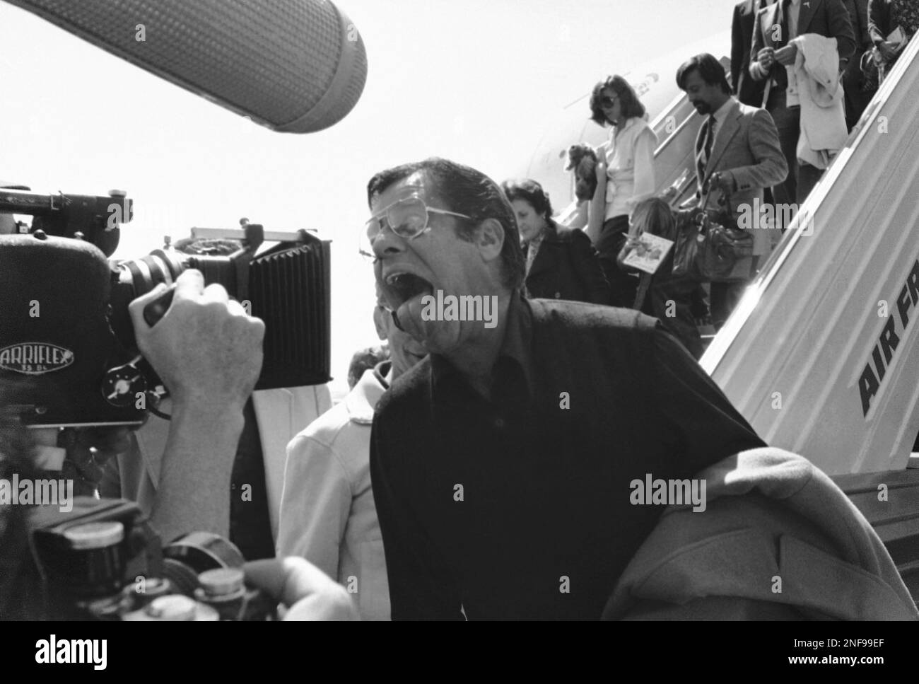 American comedic actor Jerry Lewis sticks out his tongue as he arrives ...