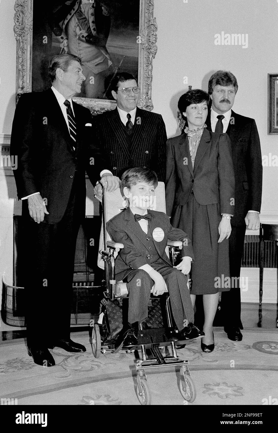 President Ronald Reagan, left, poses with Christopher Rush, 6, the ...