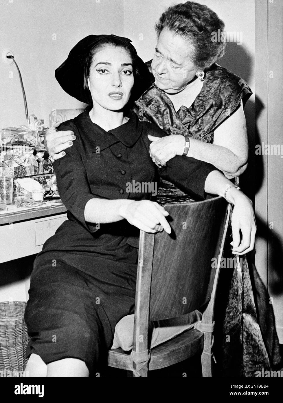 Opera star Maria Callas is comforted by socialite Elsa Maxwell in her ...