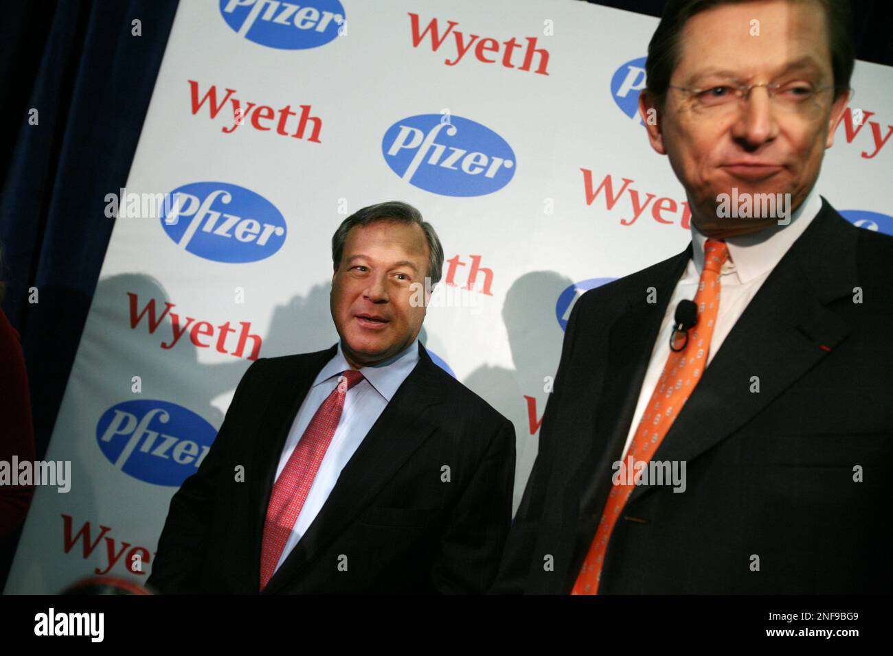 Jeffrey Kindler, left, chairman and CEO of Pfizer, and Bernard Poussot ...