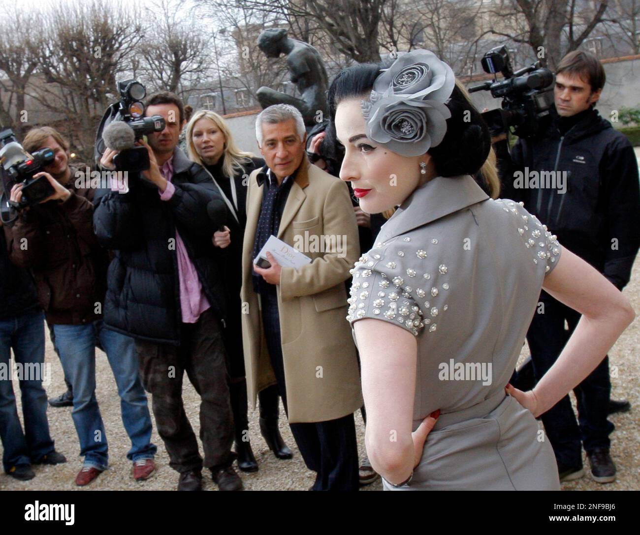 U.S burlesque star Dita Von Teese poses as she arrives for the ...