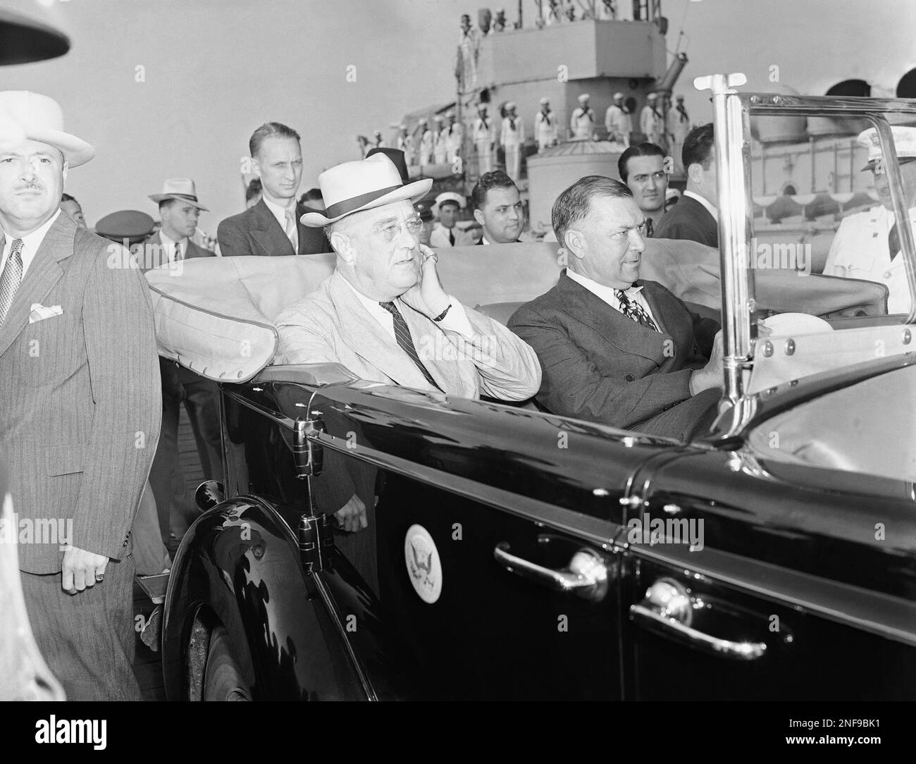 President Franklin D. Roosevelt rides in a car with Gen. Edwin M ...