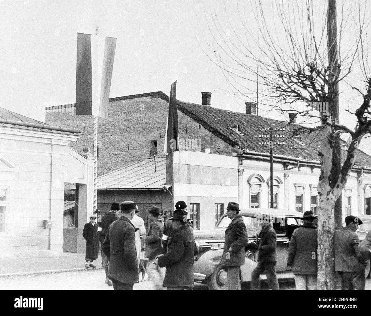 The flag of old imperial Russia, seen in background, was hoisted over ...