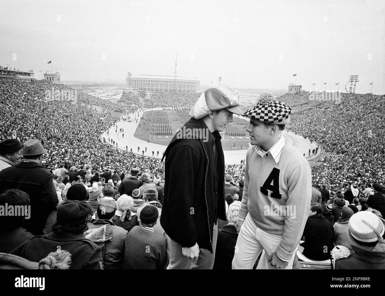 Army and Navy cheerleaders stand face to face high over Philadelphia's ...
