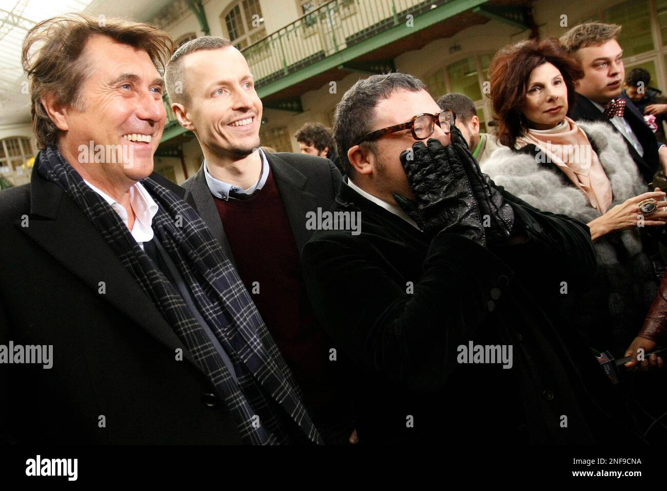 From left, British singer Bryan Ferry, Dutch fashion designer Lucas ...