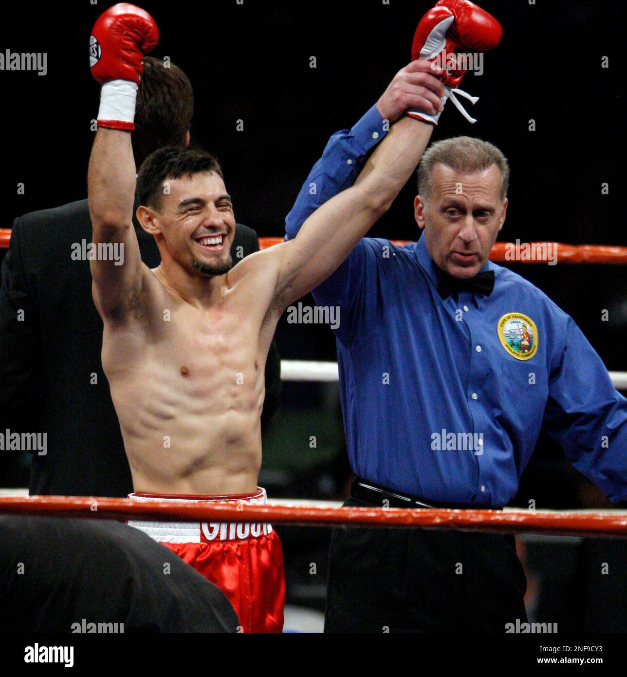 Referee Jack Reiss, right, declares Robert Guerrero the winner by knock ...
