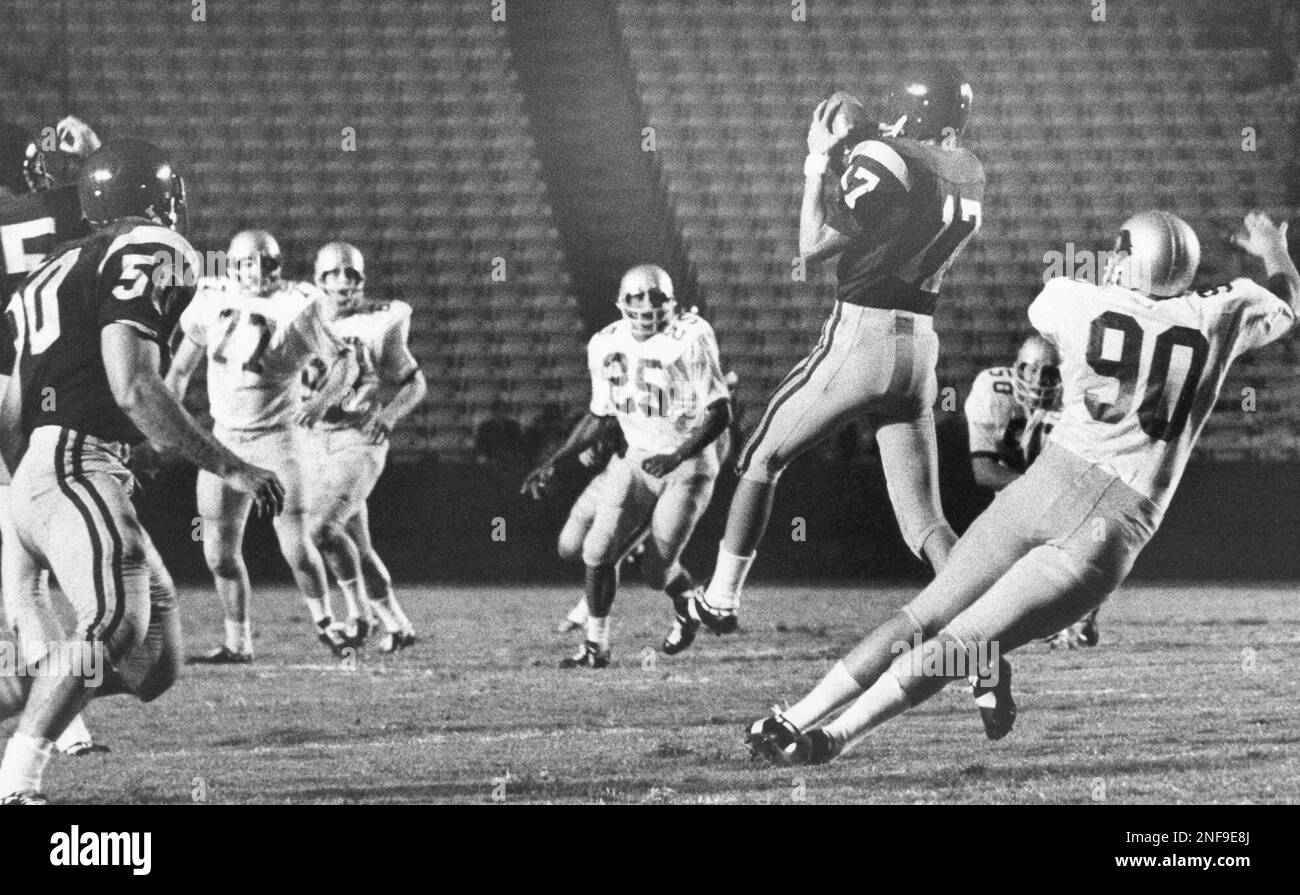 Mike Battle of Southern California pulls down a Washington State pass ...