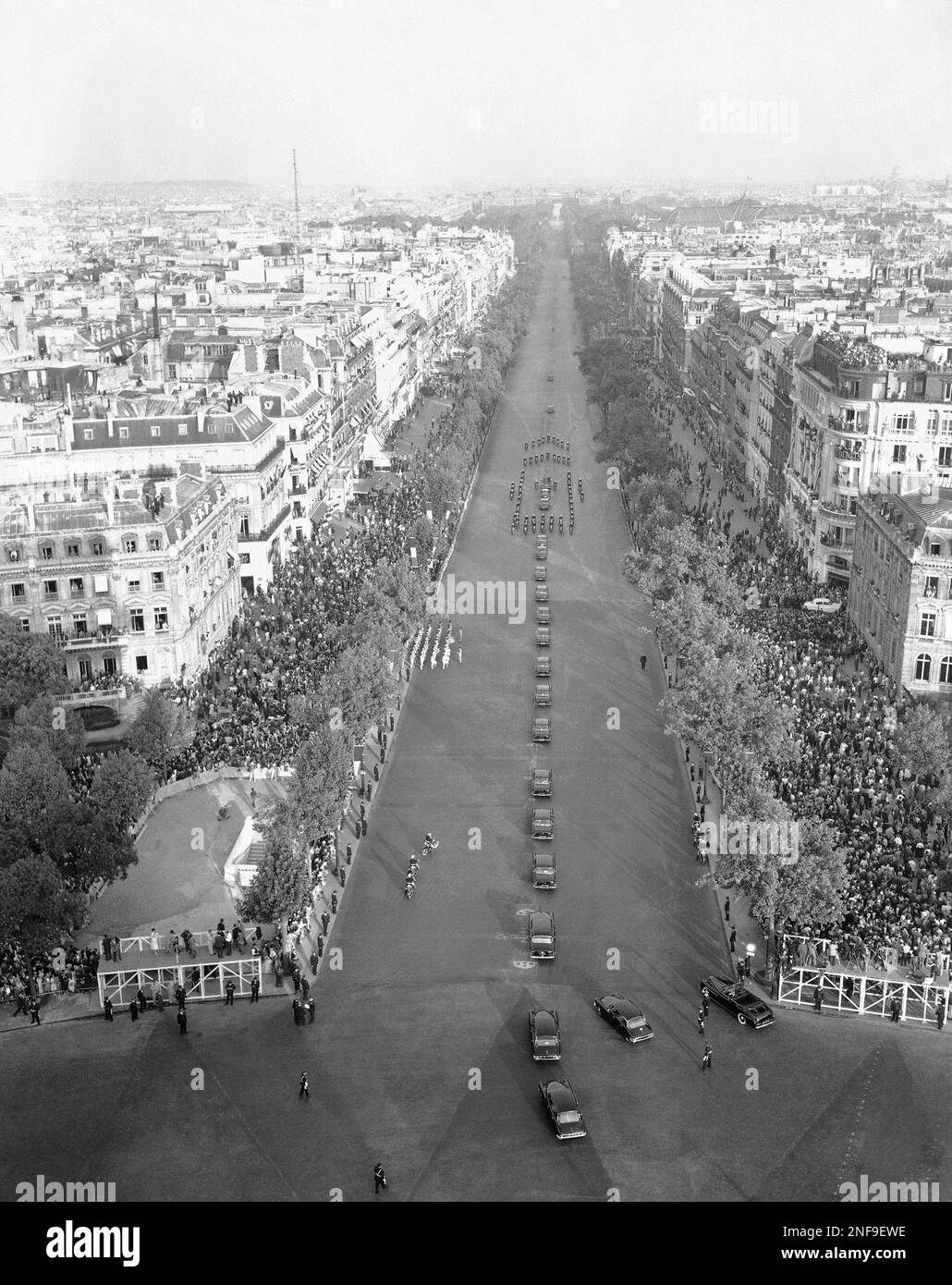 A motorcade carrying U.S. Presidents Eisenhower and French President De ...