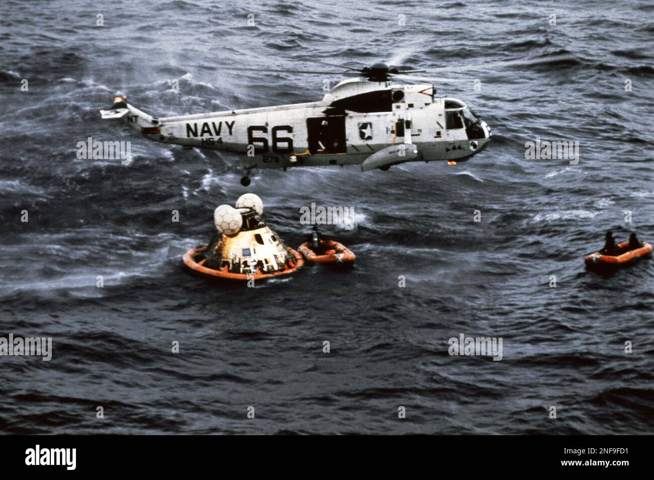 Apollo 11 crew boarding a recovery helicopter, July 24, 1969. (AP Photo ...