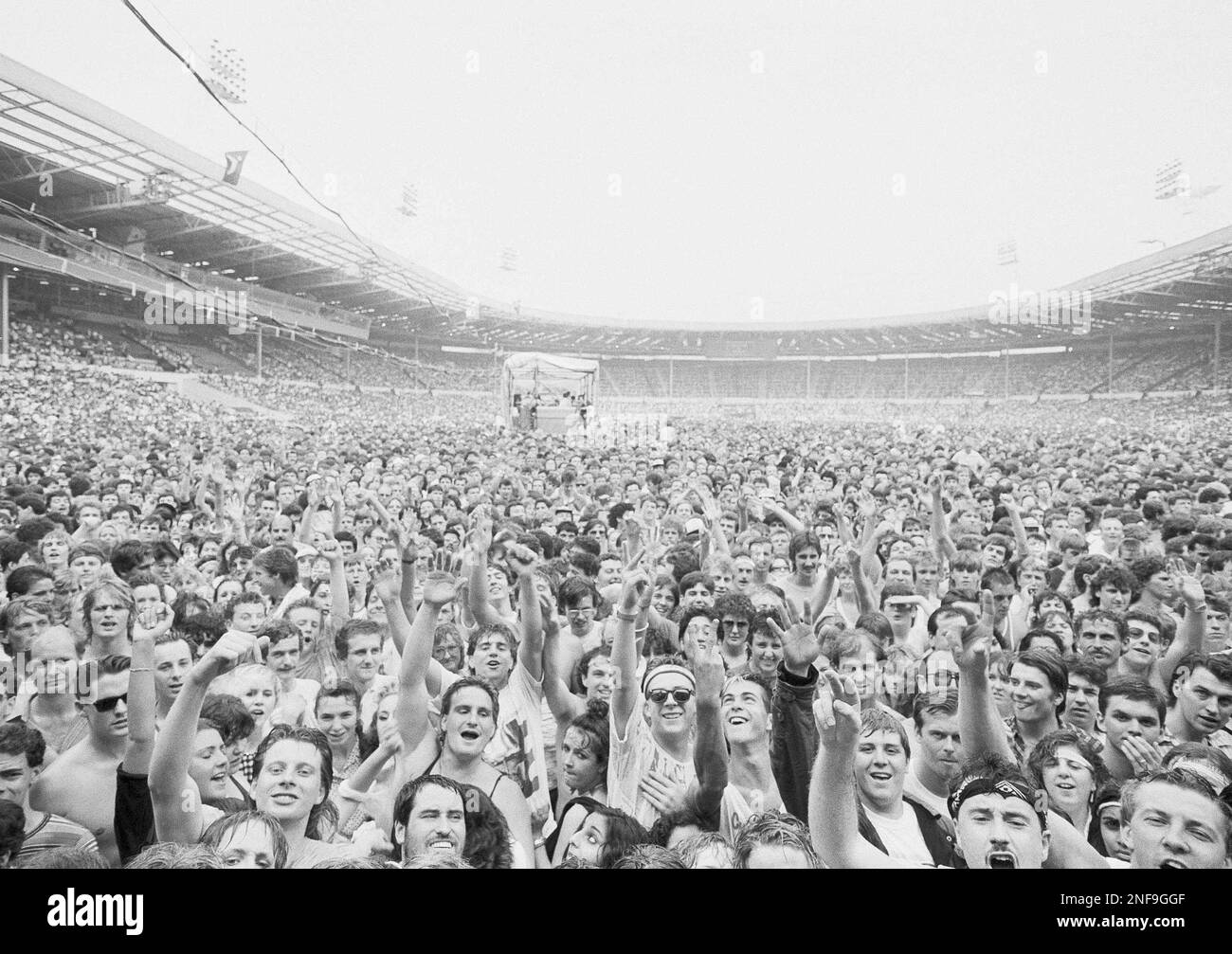 Excited Bruce Springsteen fans pictured at Wembley Stadium here, July 4 ...