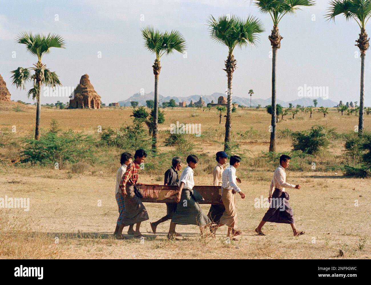 Residents of Pagan, Burma, on Jan. 15, 1994, carry a coffin to the ...