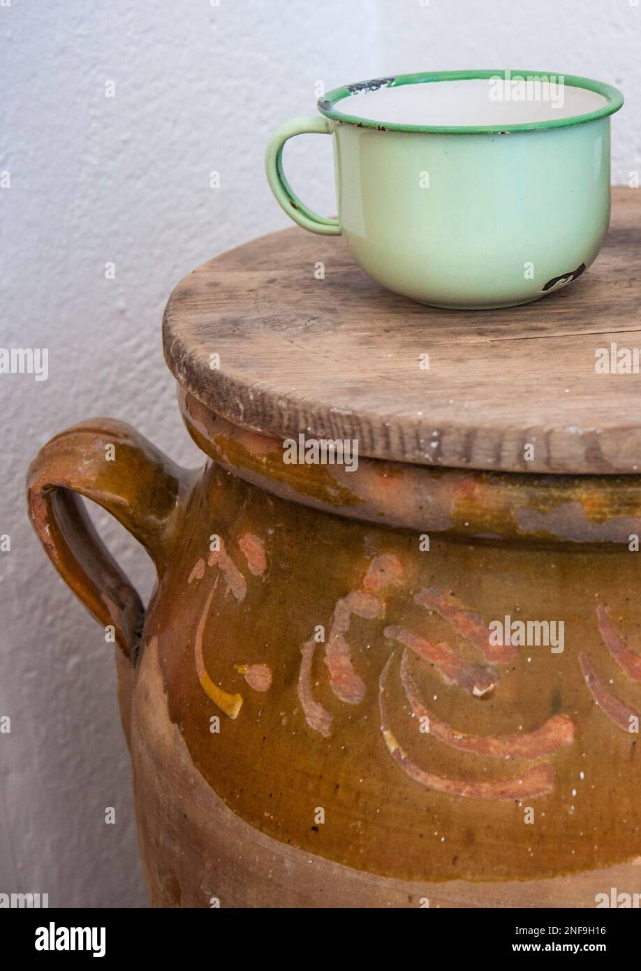Large earthenware jar with enamel ware for drinking water. Old Cottage ...