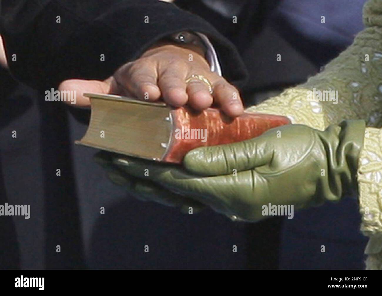 President Barack Obama rests his hand on President Lincoln's Inaugural ...